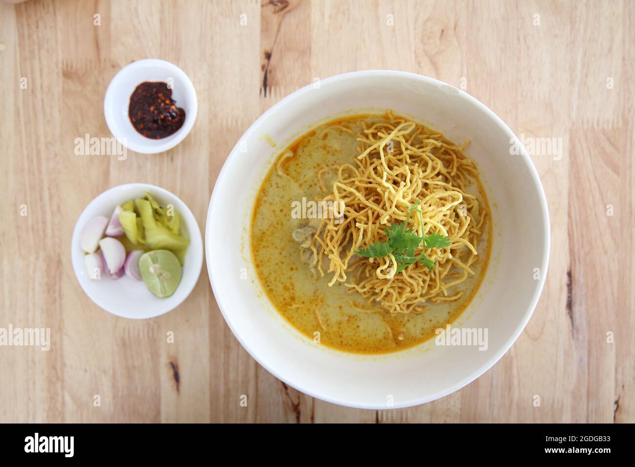 Northern Thai Noodle Khao soy in wood Stock Photo - Alamy