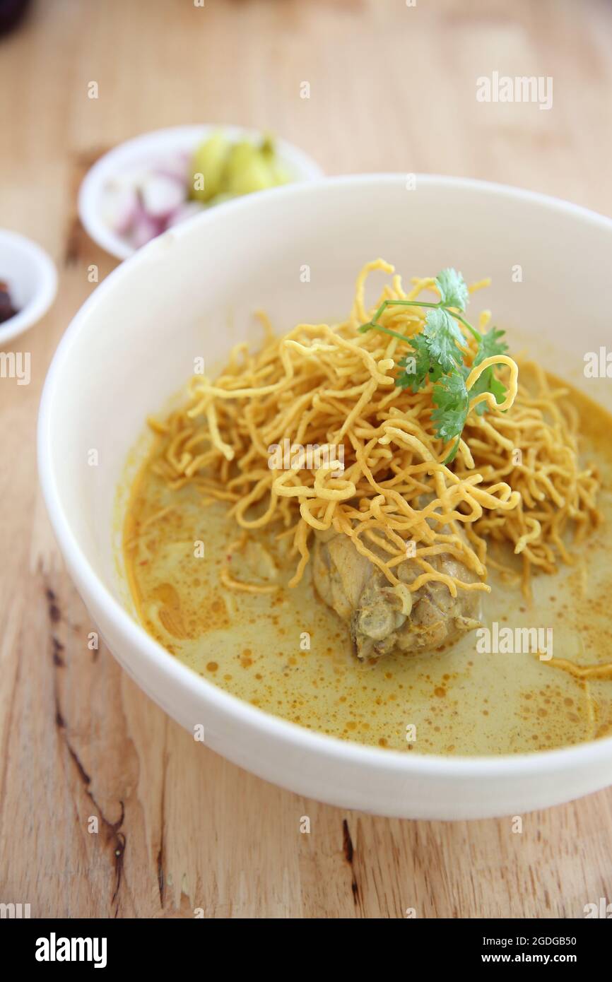 Northern Thai Noodle Khao soy in wood Stock Photo - Alamy