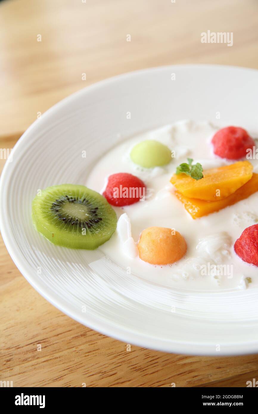 Fruit pudding on wood background Stock Photo - Alamy