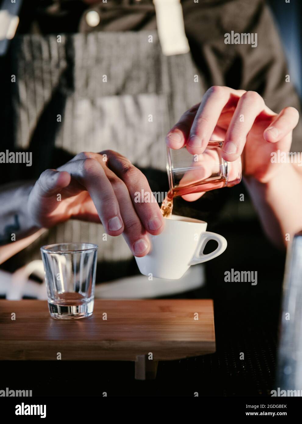 Bartender Pouring and Mixing a Drink Stock Photo - Alamy