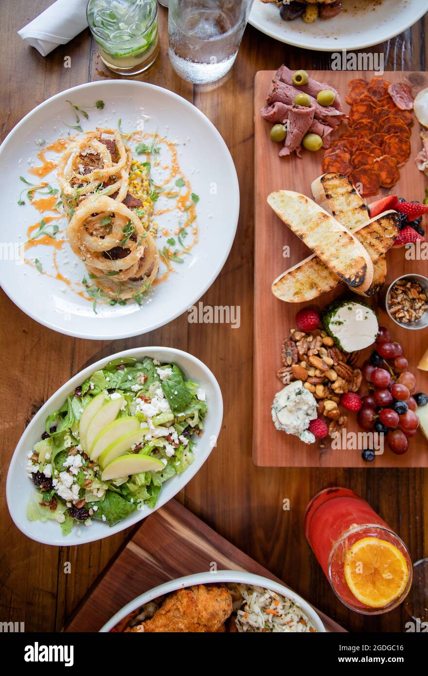 Tabletop Scene During Dinner with Friends Stock Photo - Alamy