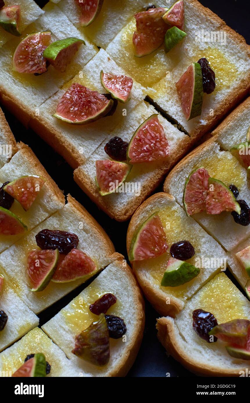 Honey and fig with raisin on the bread Stock Photo - Alamy