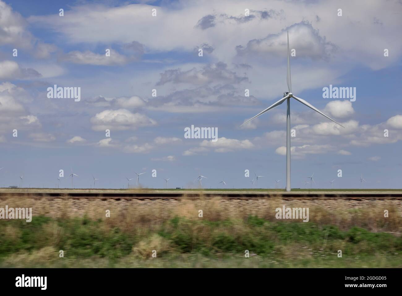 Wind turbines generate electricity near farms in West Texas Stock Photo ...