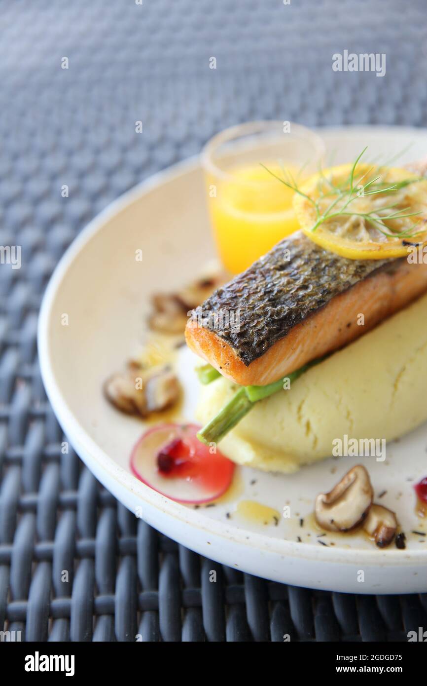 salmon steak with orange sauce Stock Photo - Alamy