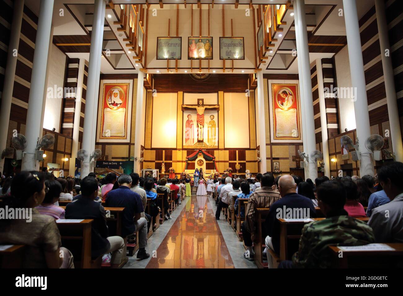 Stained glass windows in small church with wood pews Stock Photo - Alamy