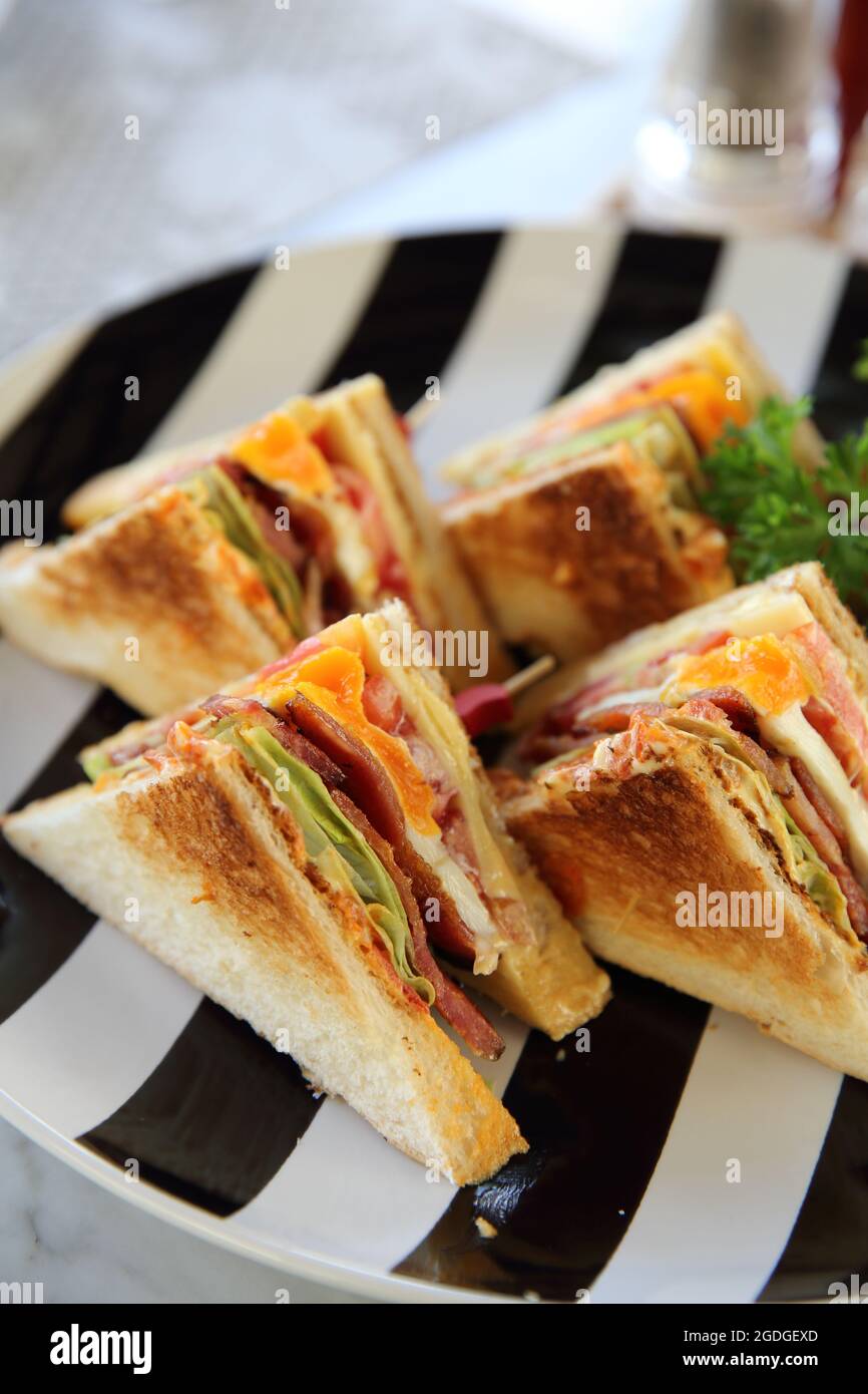 breakfast Club sandwich with chips Stock Photo - Alamy