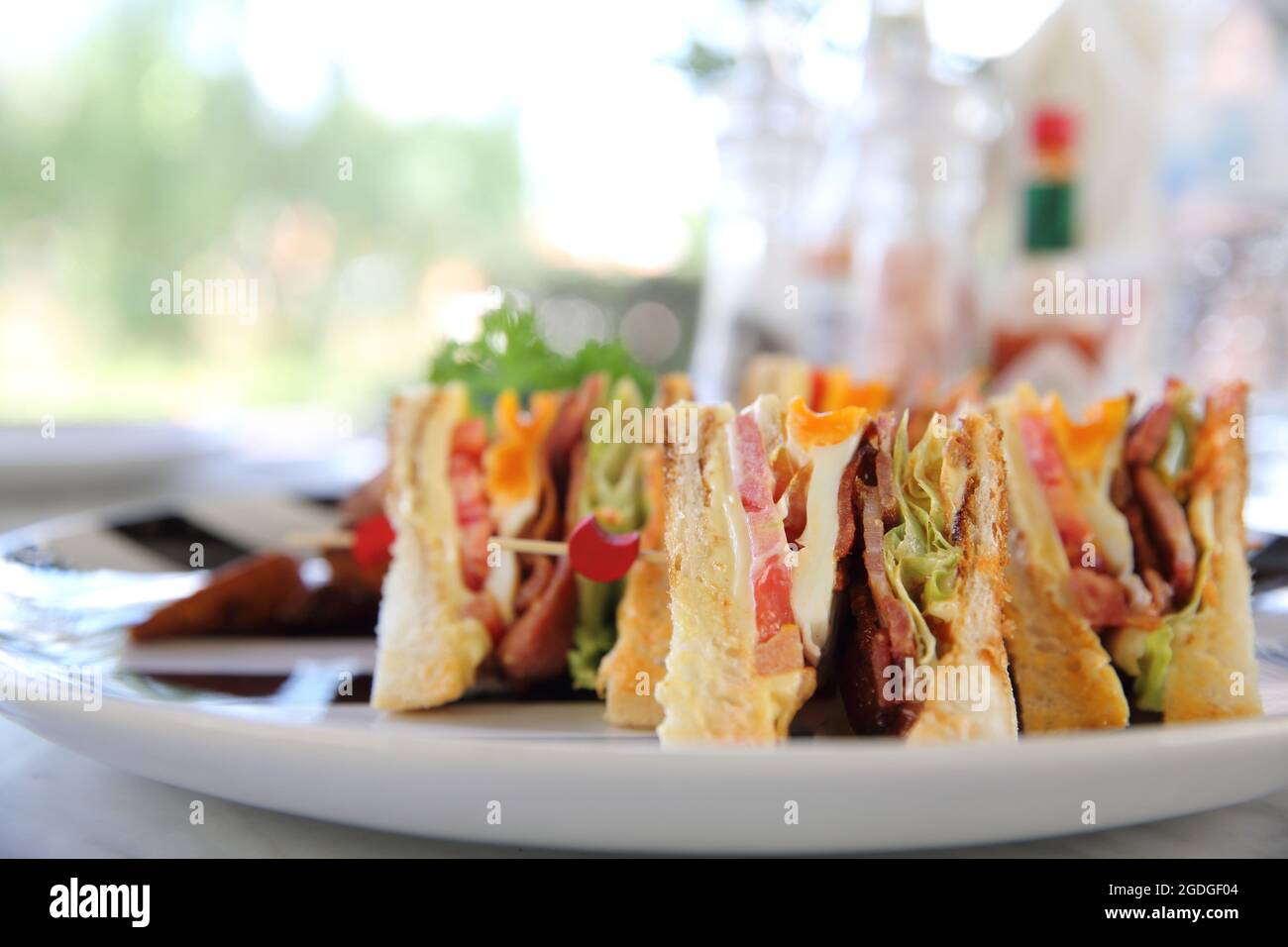 breakfast Club sandwich with chips Stock Photo - Alamy