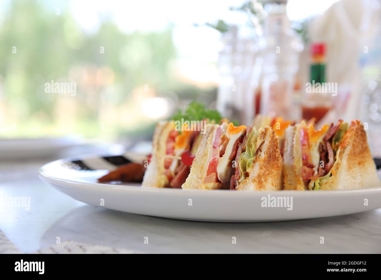breakfast Club sandwich with chips Stock Photo - Alamy