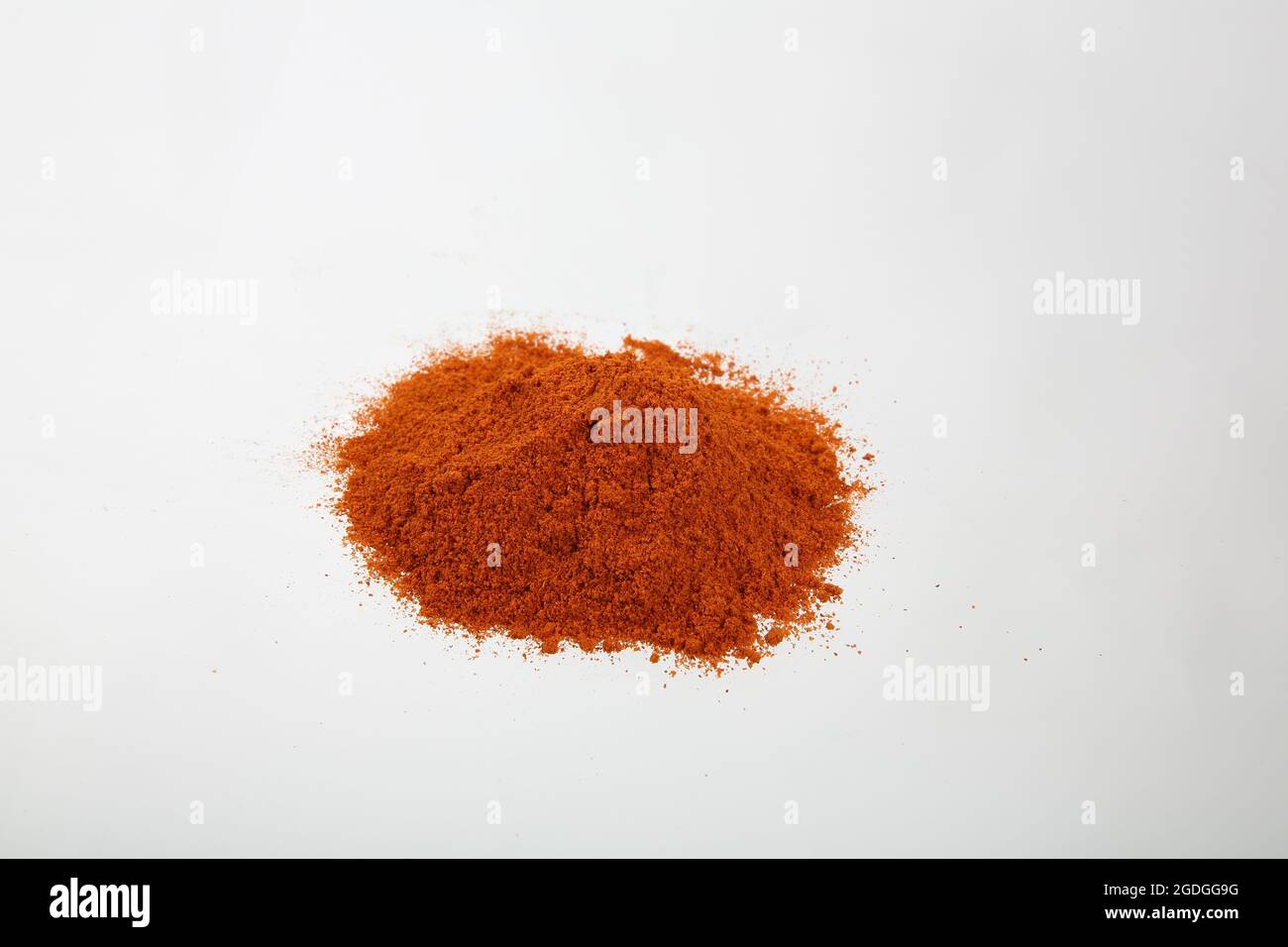 border of ground paprika on white background Stock Photo - Alamy