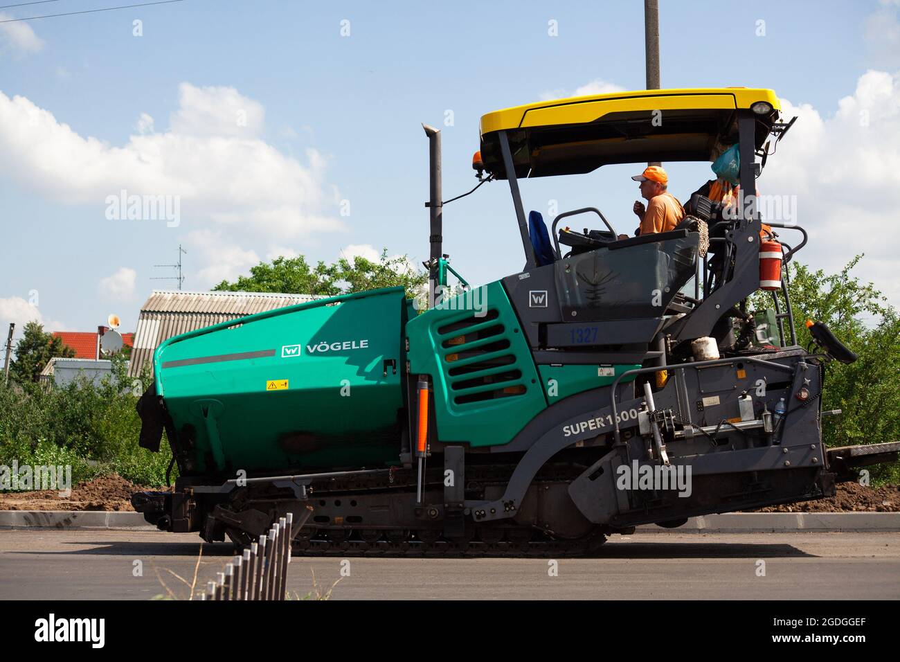 Kharkov, Ukraine - 17 july 2021. Asphalt paver machine on the road ...