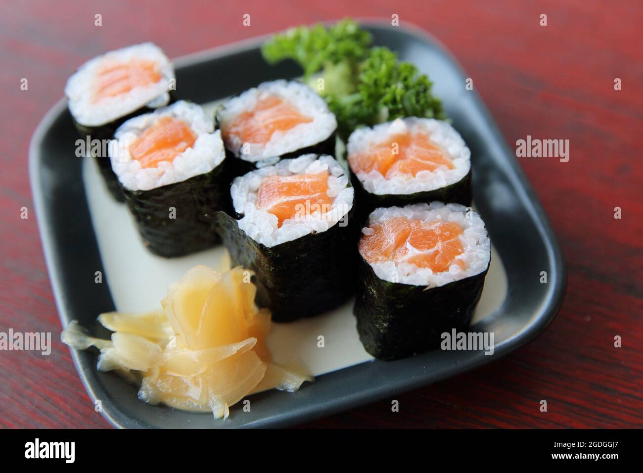 Salmon Maki sushi Stock Photo - Alamy