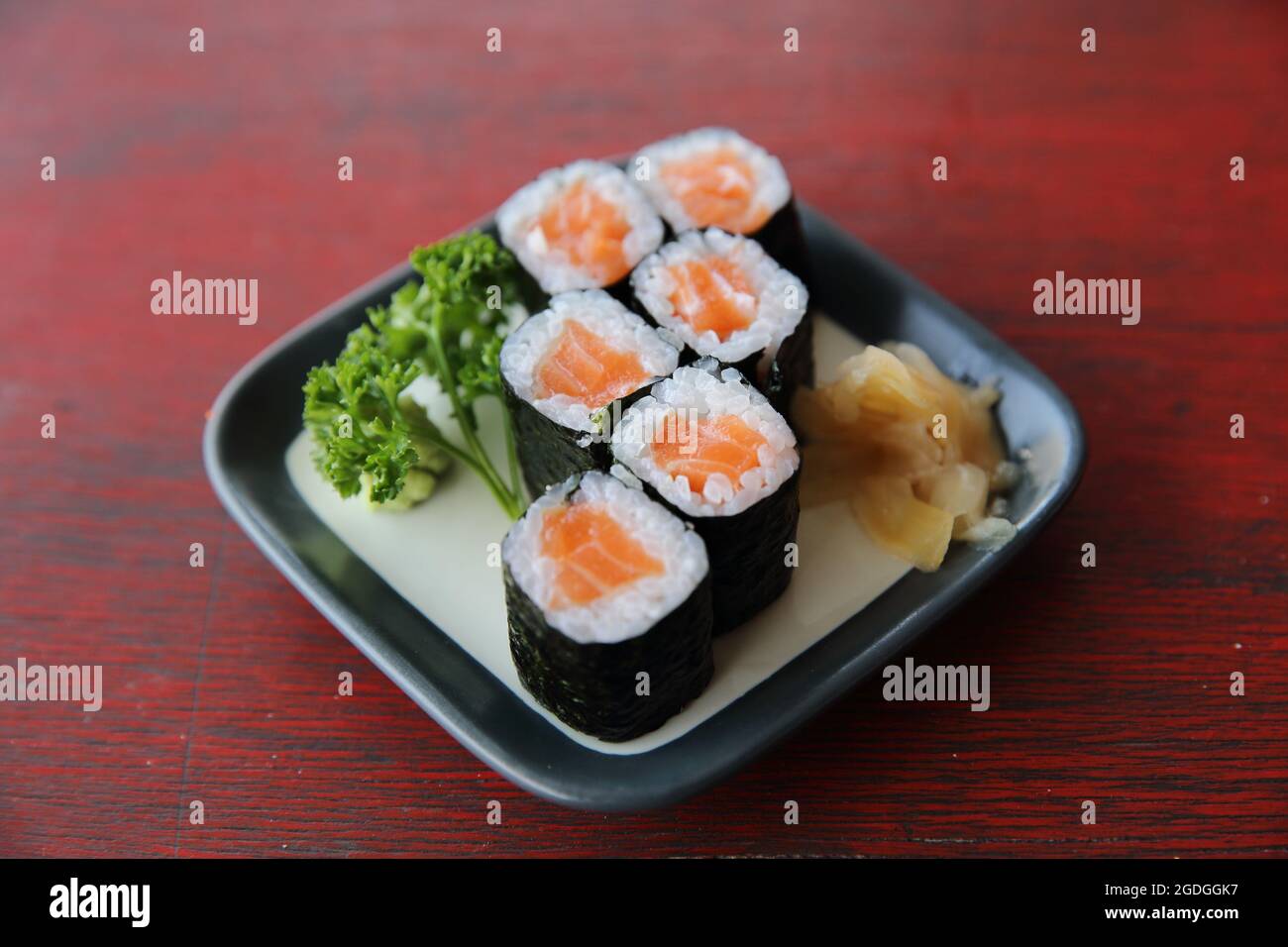Salmon Maki sushi Stock Photo - Alamy