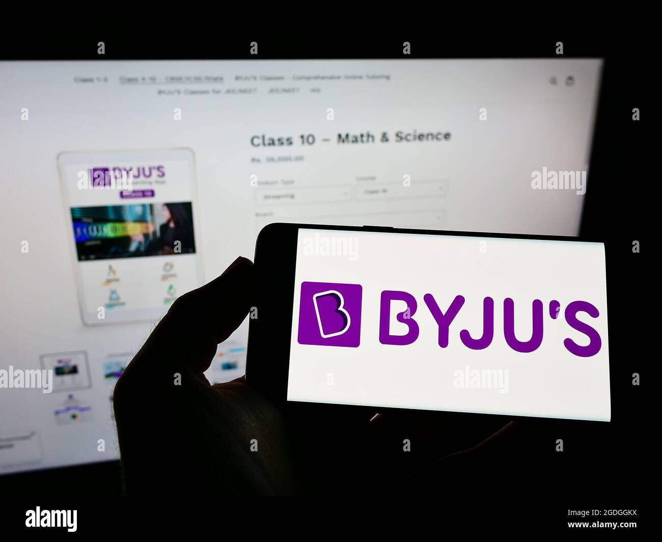 Person holding cellphone with logo of Indian e-learning company Byju’s ...