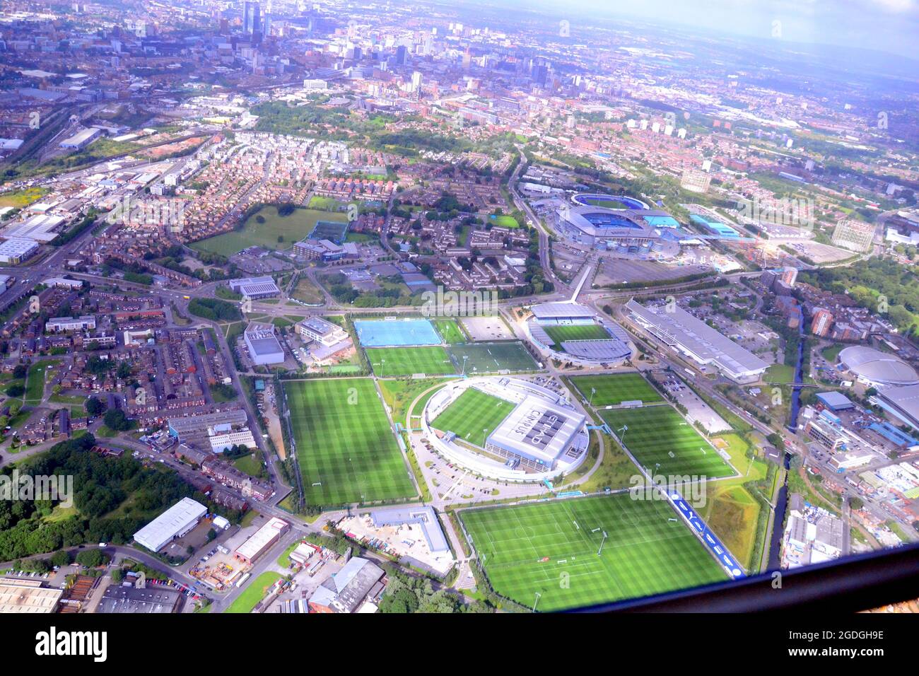 Manchester, UK, 13th August, 2021. Manchester seen from the air. Etihad ...