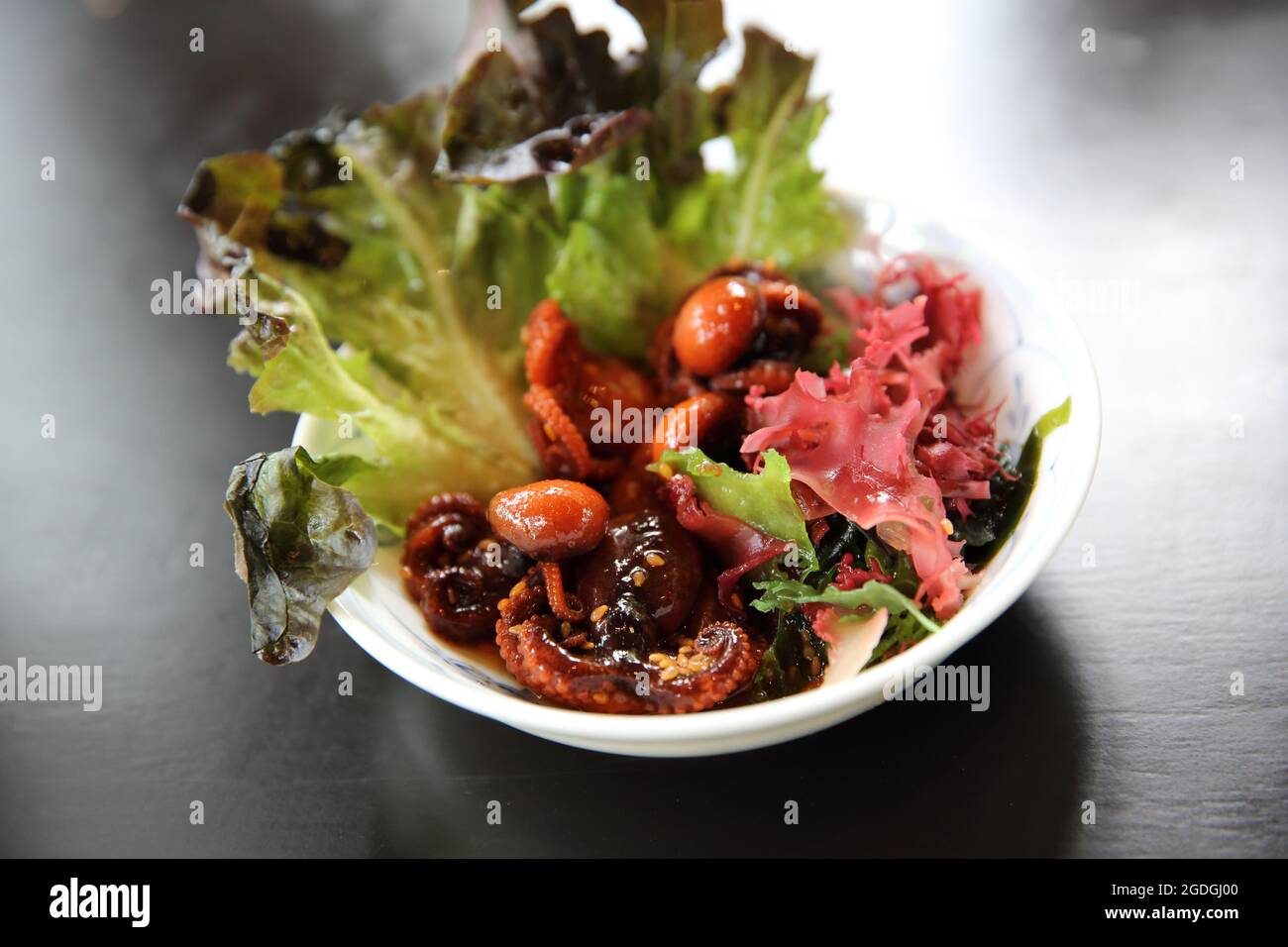 Baby tako kimchi squid Stock Photo - Alamy