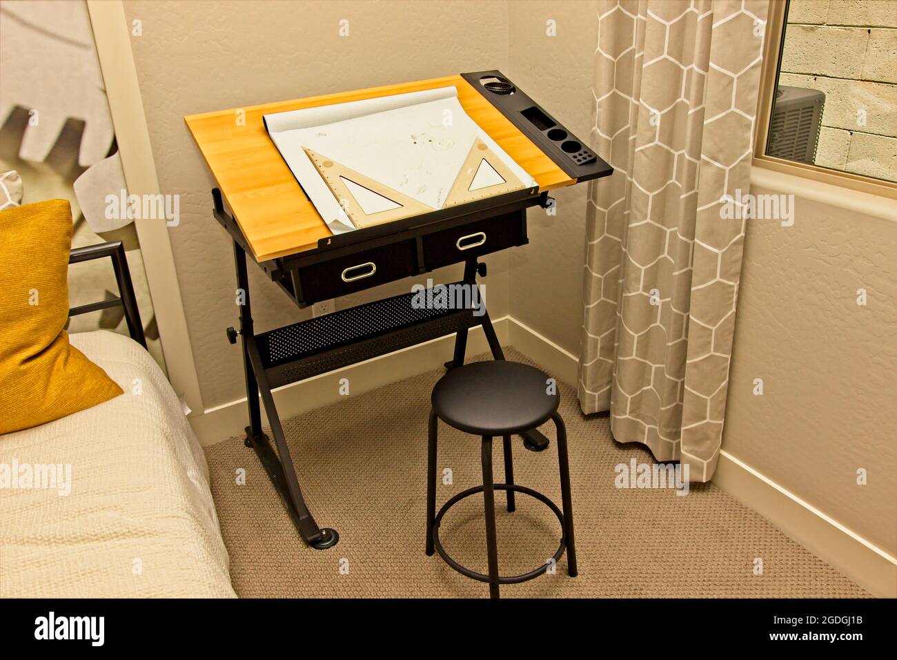 Small Adjustable Drafting Table In Corner Of Bedroom Stock Photo - Alamy