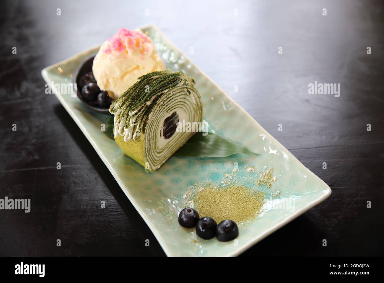 green tea roll cake with ice cream Stock Photo - Alamy