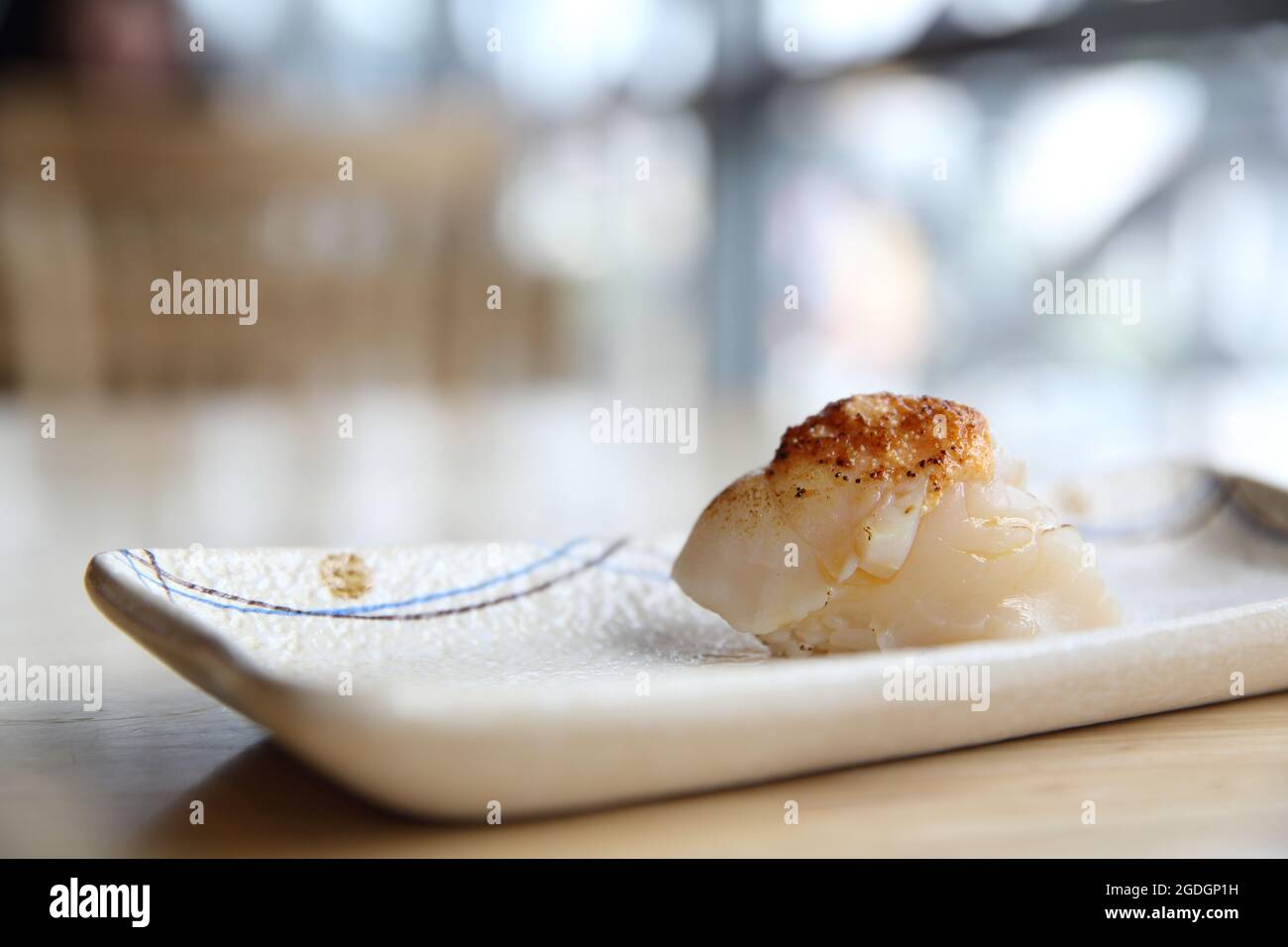 Fresh sea scallops sushi Japanese food Stock Photo - Alamy