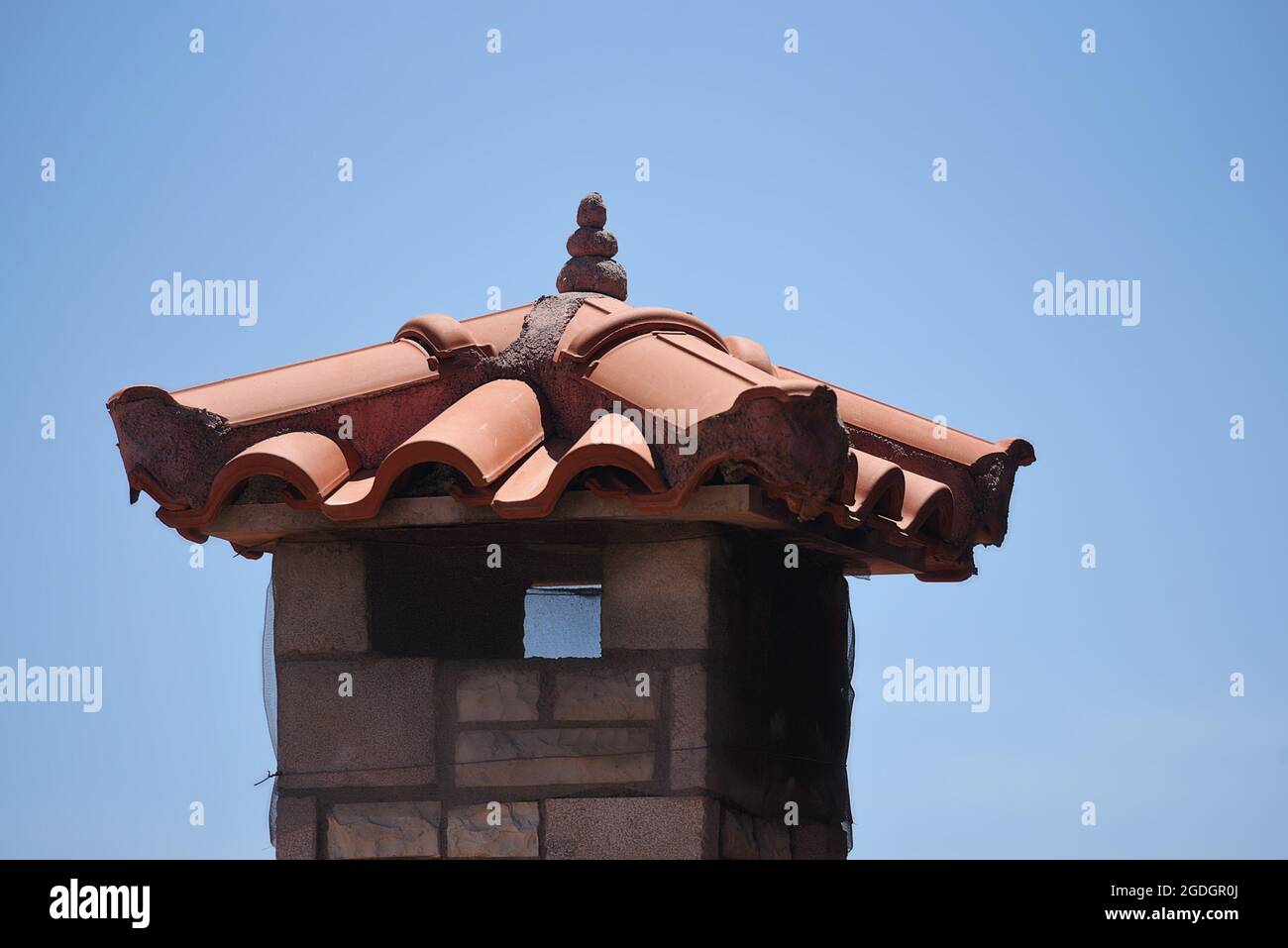 Rural house chimney with a clay tile rooftop in Dimitsana a traditional ...