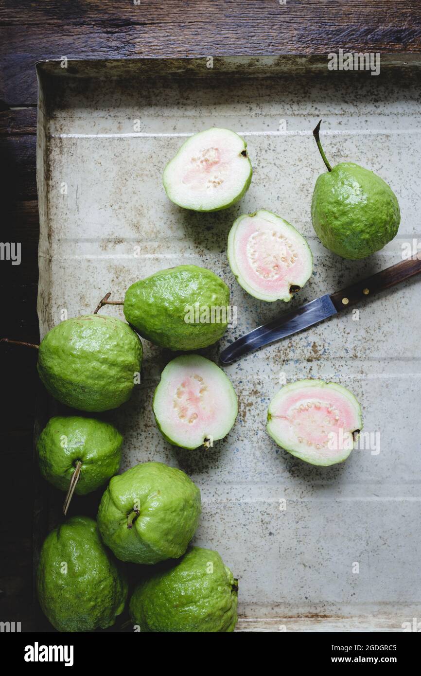 Vertical closeup of sliced guava. Top view Stock Photo - Alamy