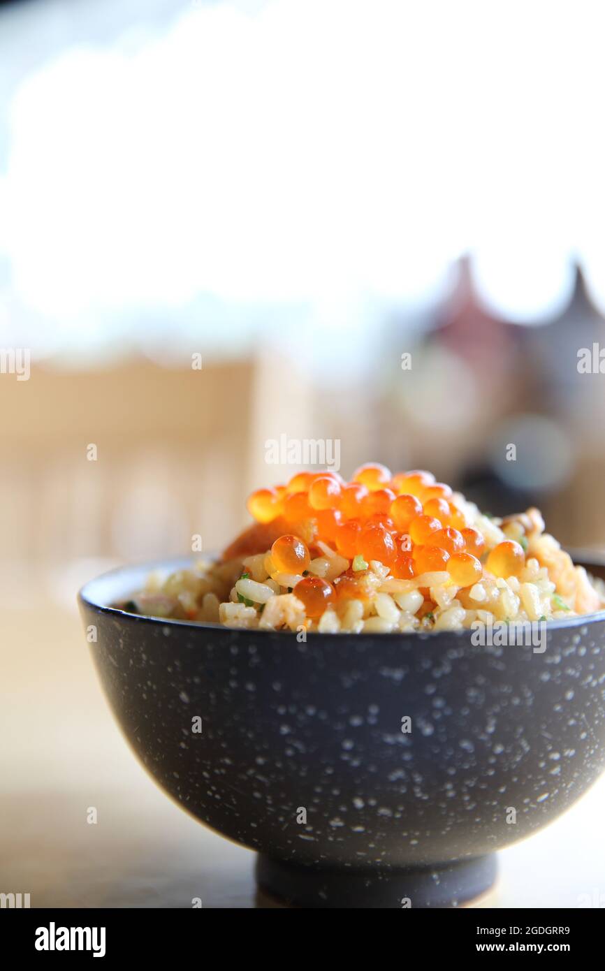 Salmon fish and egg fried rice Stock Photo - Alamy