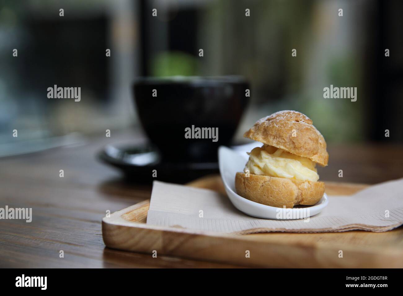Cream puff choux cream in close up Stock Photo - Alamy
