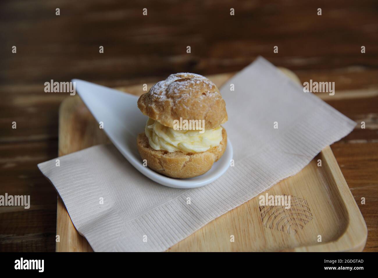 Cream puff choux cream in close up Stock Photo - Alamy