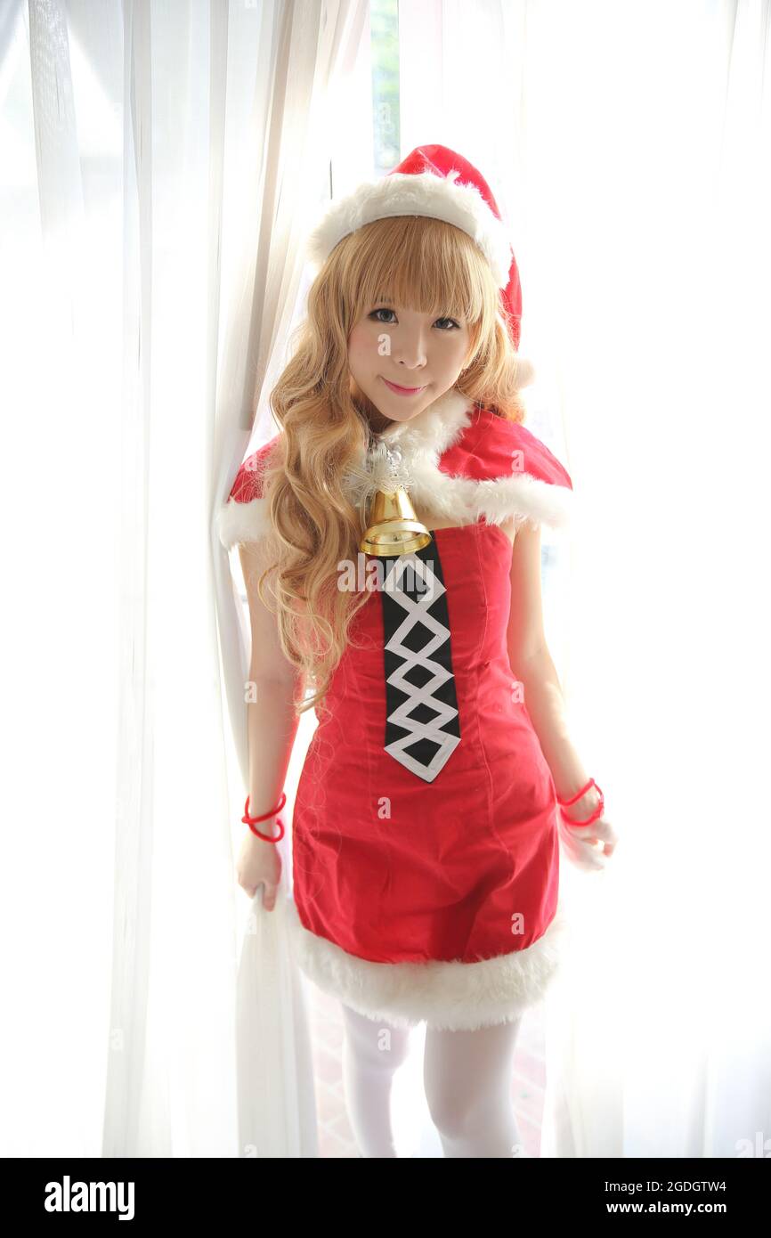 Christmas asian woman portrait with christmas gift Stock Photo - Alamy