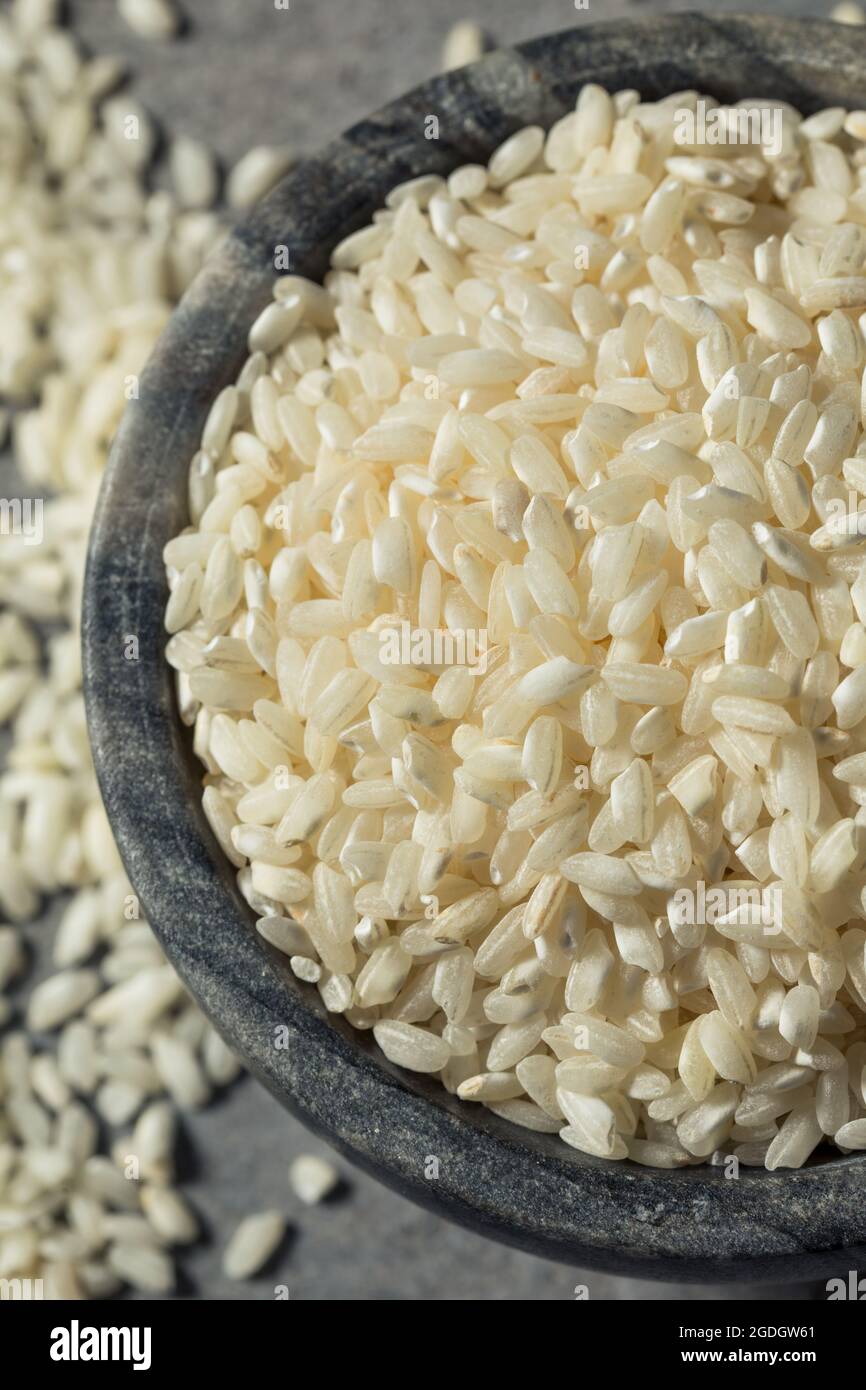 Raw White Organic Arborio Rice Ready to Cook Stock Photo - Alamy