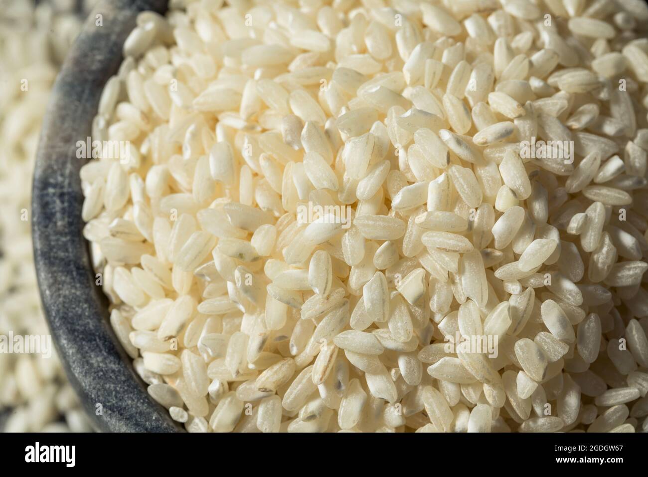 Raw White Organic Arborio Rice Ready to Cook Stock Photo - Alamy