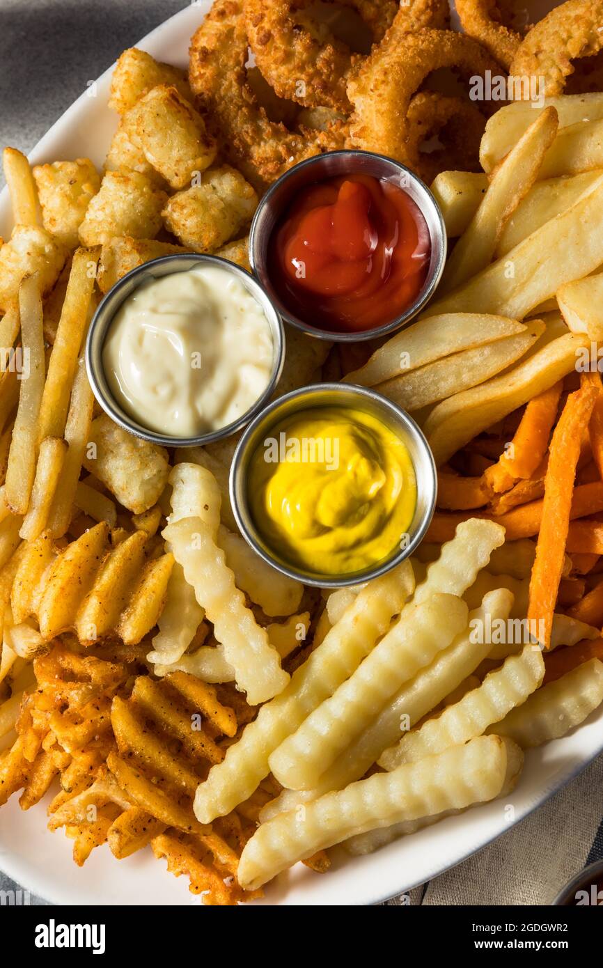 Homemade Crispy Deep Fried French Fry Platter with Dipping Sauces Stock ...