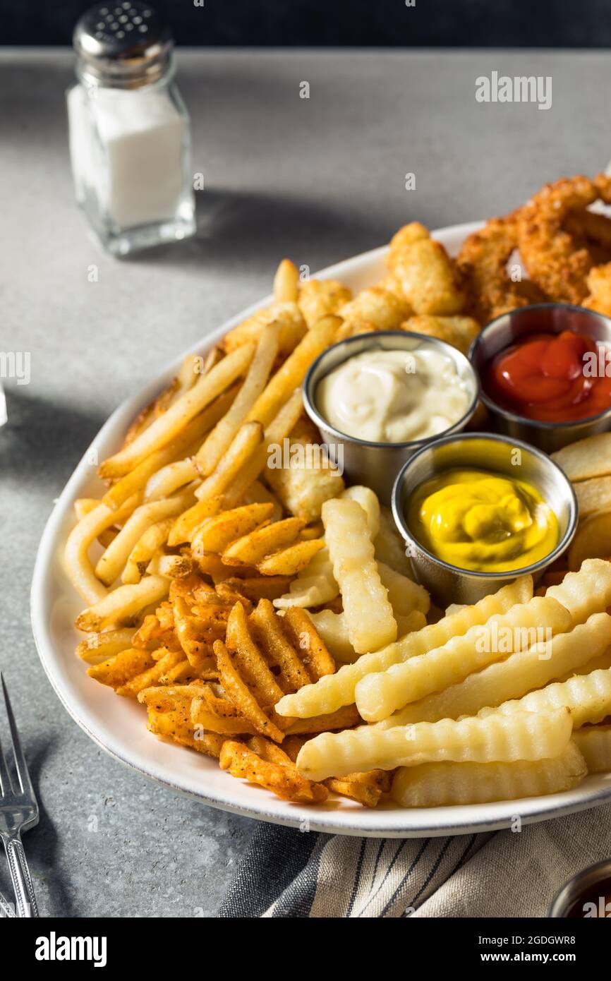 Homemade Crispy Deep Fried French Fry Platter with Dipping Sauces Stock ...
