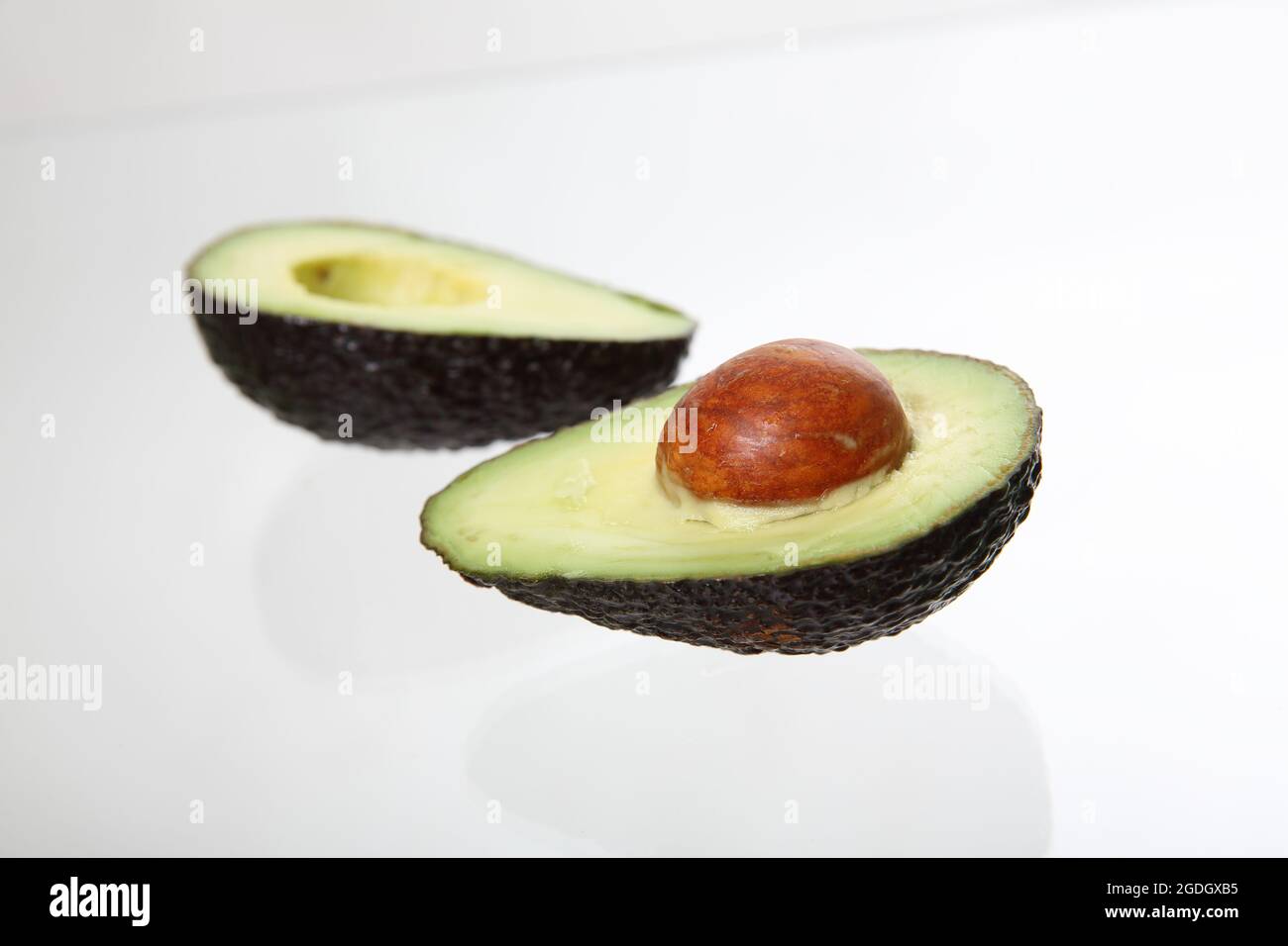 avocado isolated in white background Stock Photo - Alamy