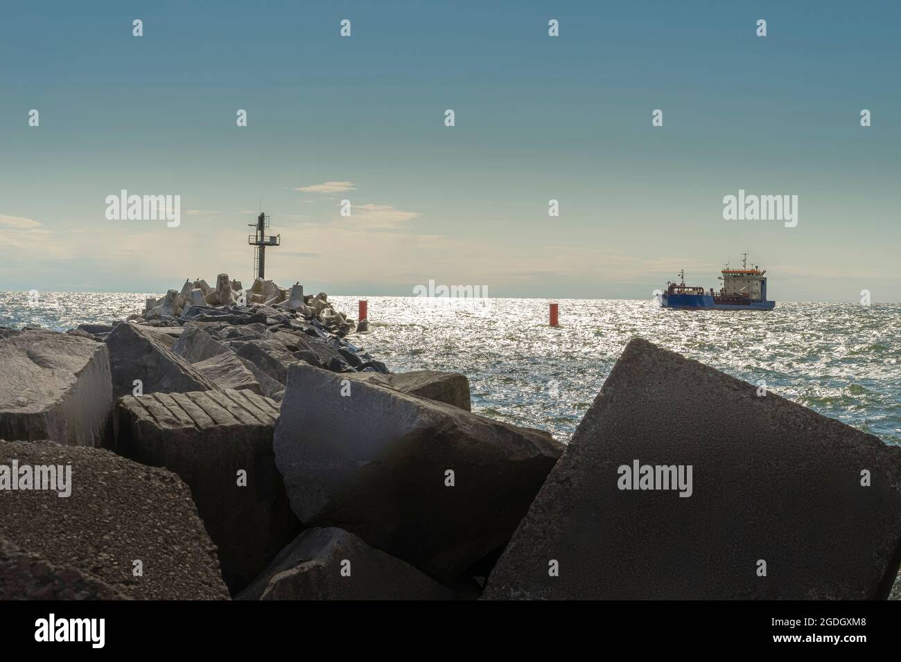 The boat enters Klaipeda seaport gate. Klaipeda is third largest city ...