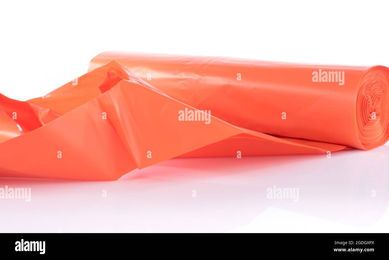 Orange garbage bag, isolated on white Stock Photo - Alamy