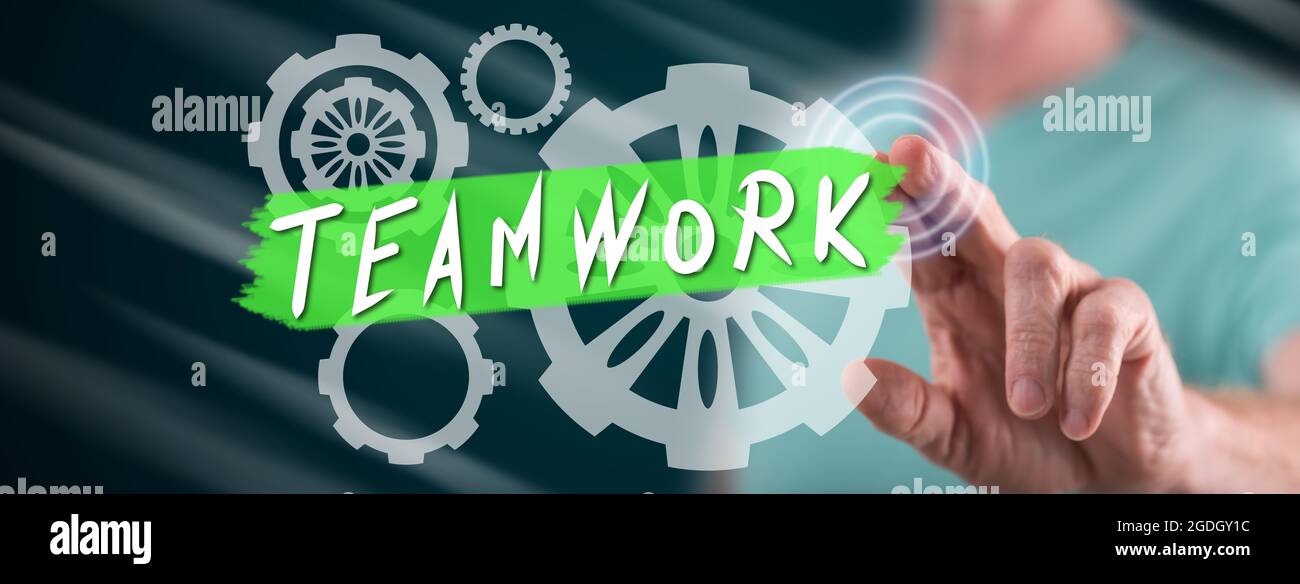 Man touching a teamwork concept on a touch screen with his finger Stock ...