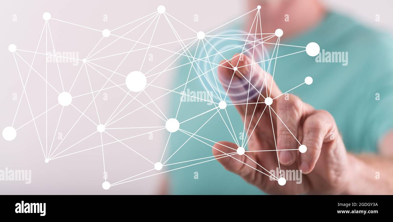 Man touching a virtual network on a touch screen with his finger Stock ...