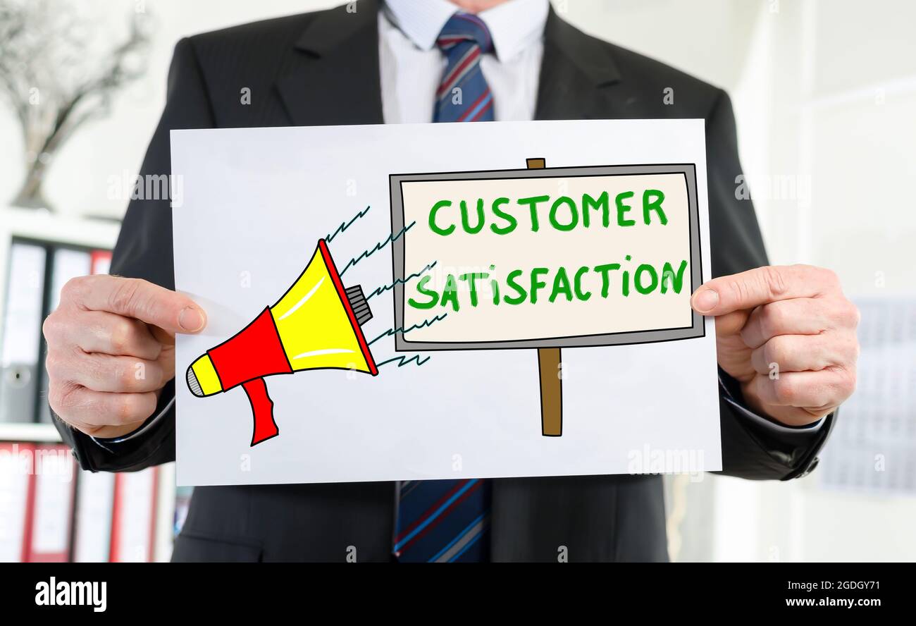 Paper showing customer satisfaction concept held by a businessman Stock ...