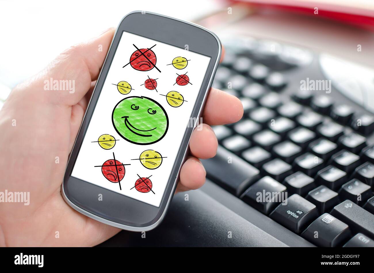 Hand holding a smartphone showing a customer satisfaction concept Stock ...