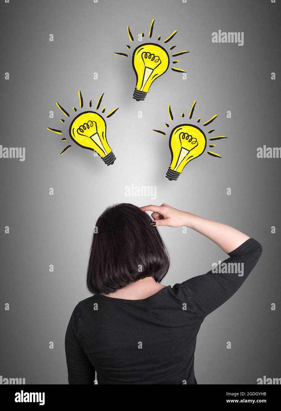 Woman thinking about new ideas, back view Stock Photo - Alamy