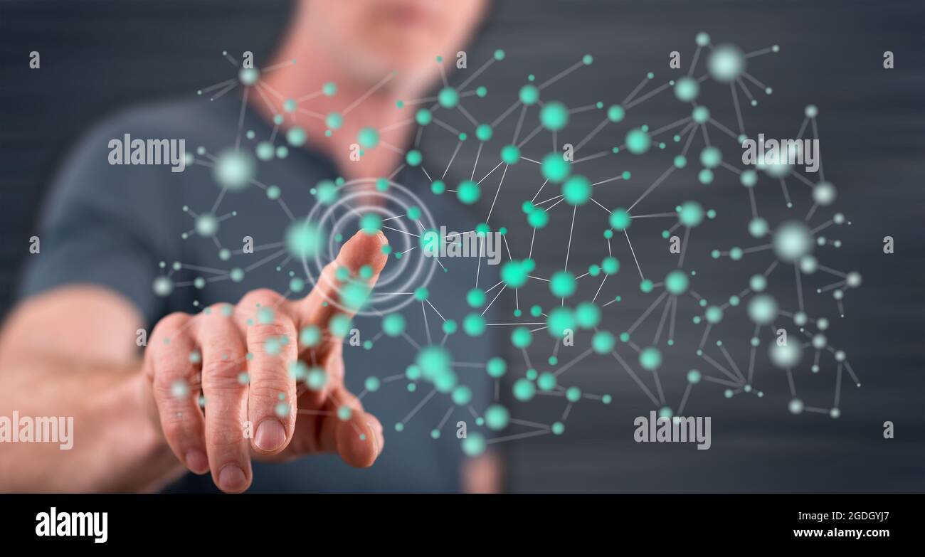 Man touching a virtual network on a touch screen with his finger Stock ...