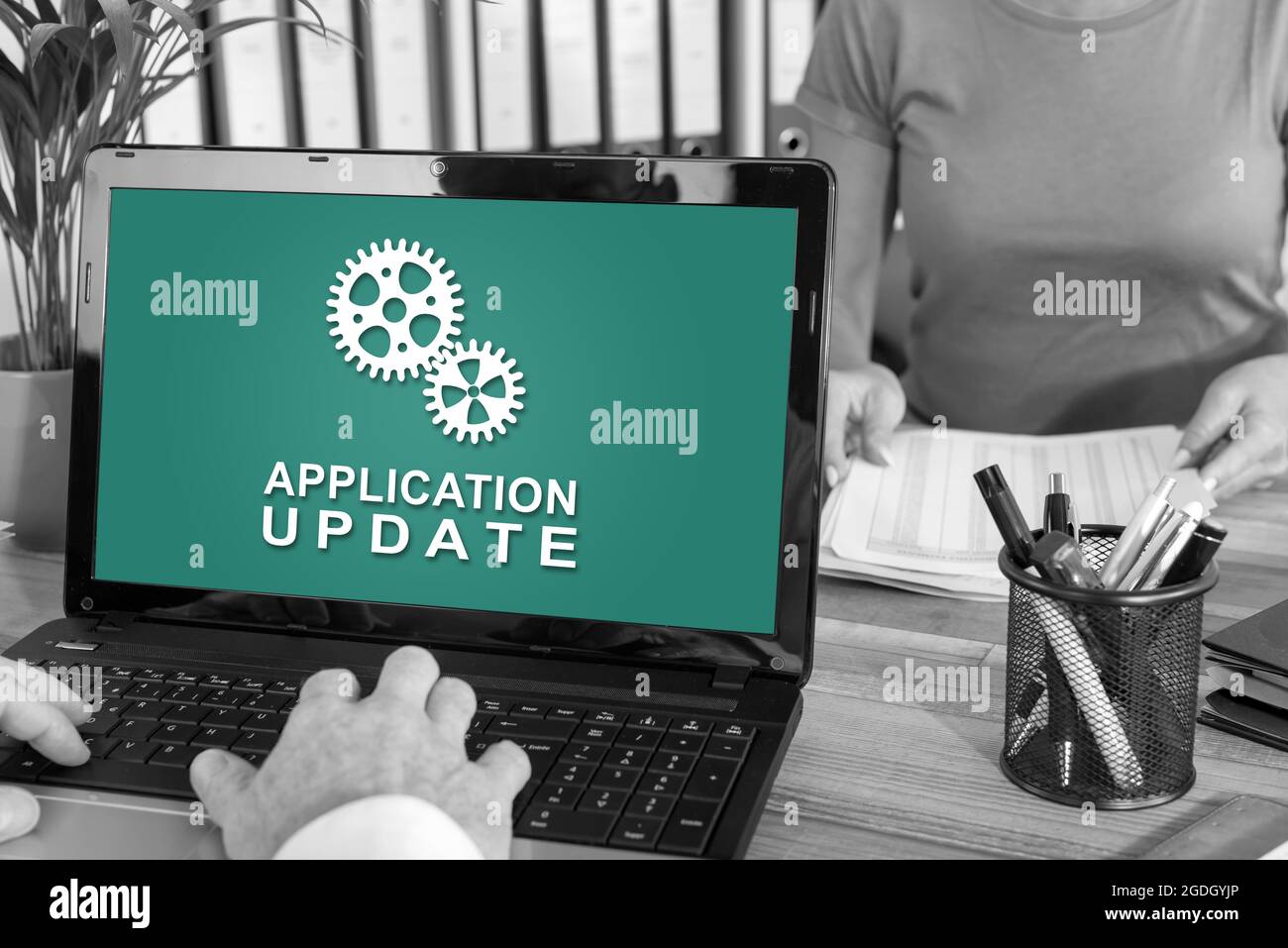 Laptop screen with application update concept Stock Photo - Alamy