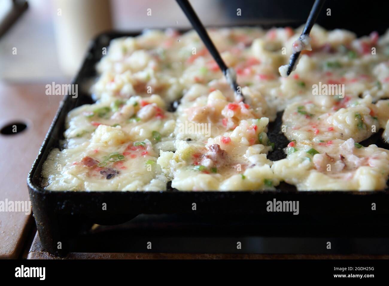 process to cooking takoyaki japanese food Stock Photo - Alamy