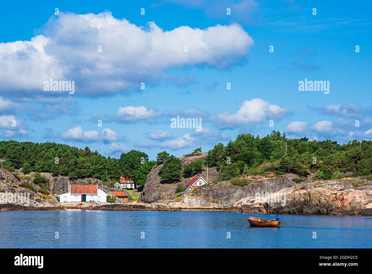 Boat in front of the archipelago island Monsøya in Norway Stock Photo ...