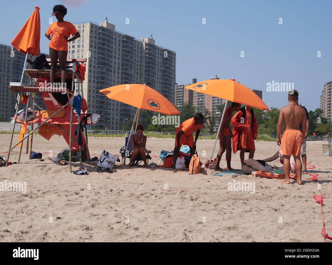 New York, New York, USA. 11th Aug, 2021. Lifeguards attend to a female ...