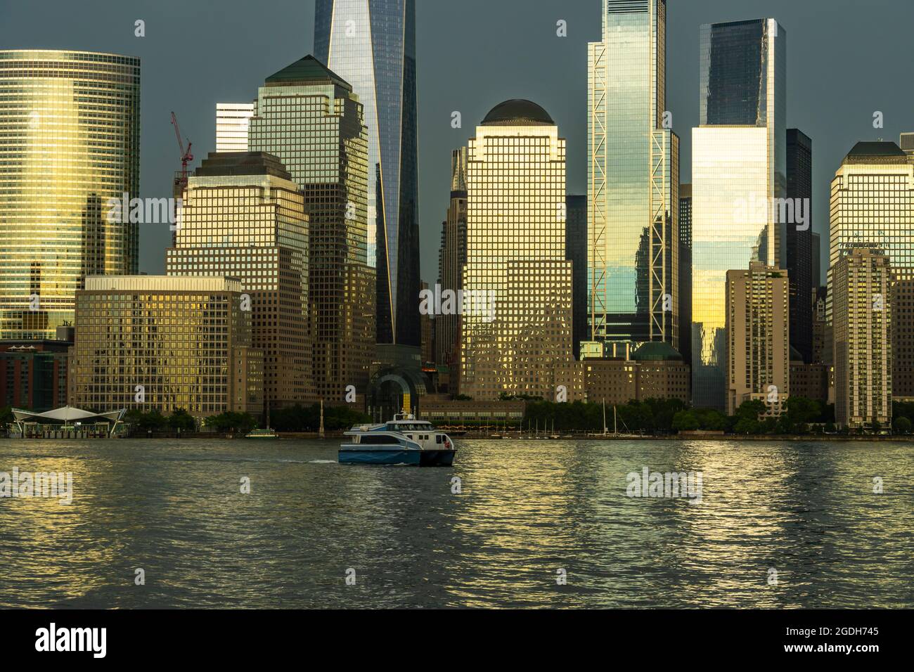 The sunlight illuminates the Lower Manhattan skyscraper NYC Stock Photo ...