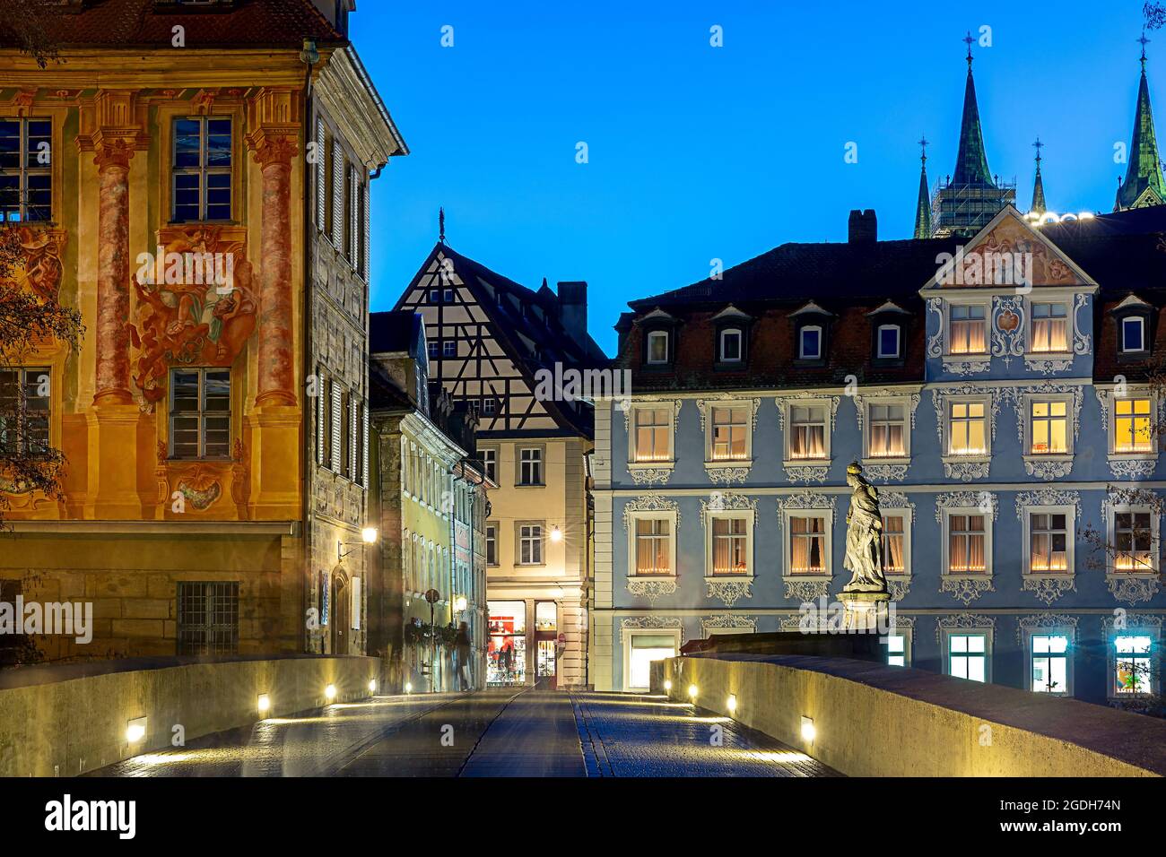 The building of the old medieval town hall on the bridge over the river ...