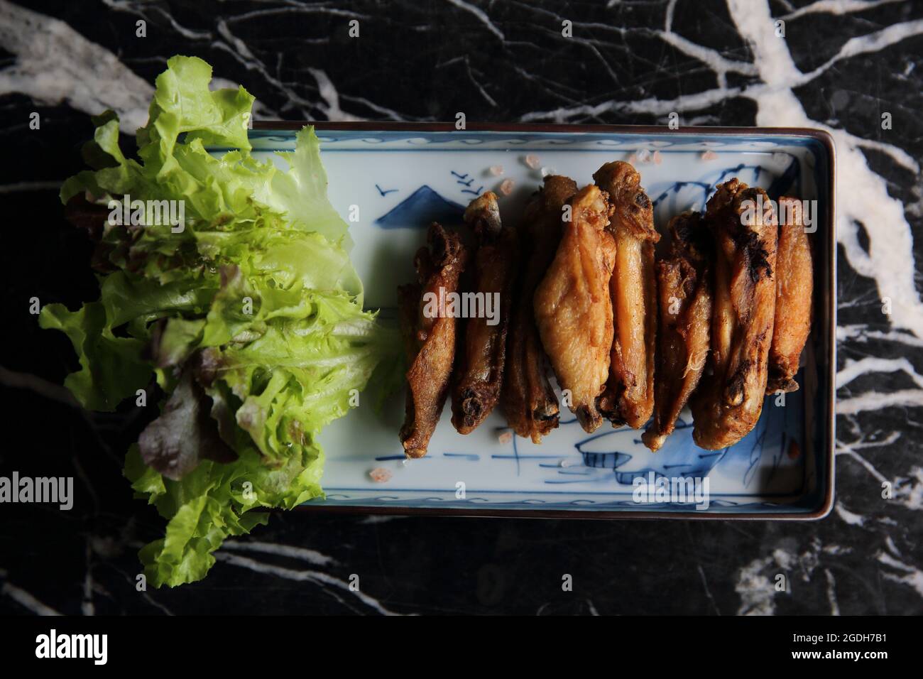Fried chicken wings Stock Photo - Alamy