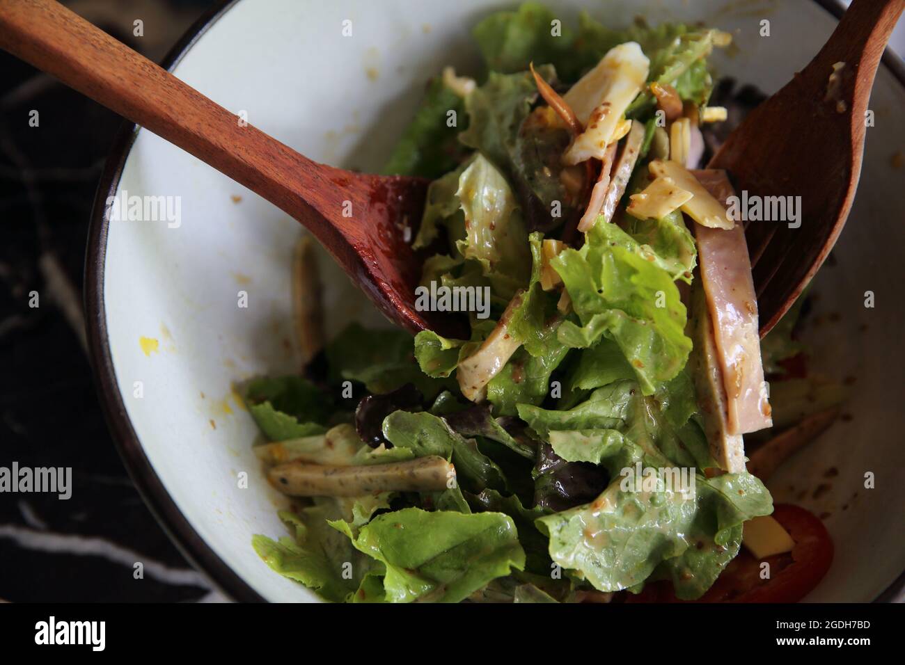 caesar salad with ham and eggs Stock Photo - Alamy