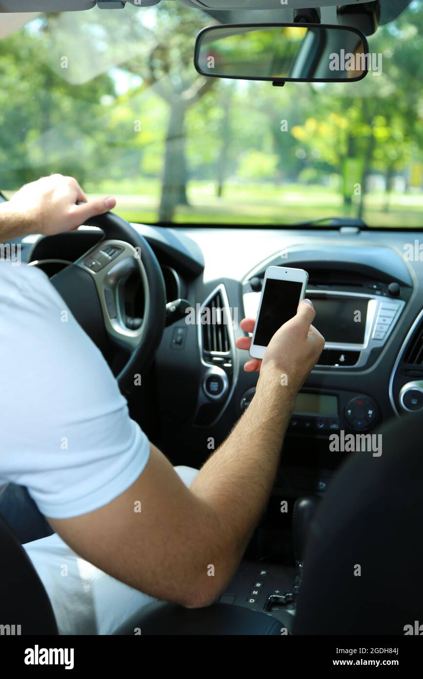 Driving car and path finding to navigator Stock Photo - Alamy